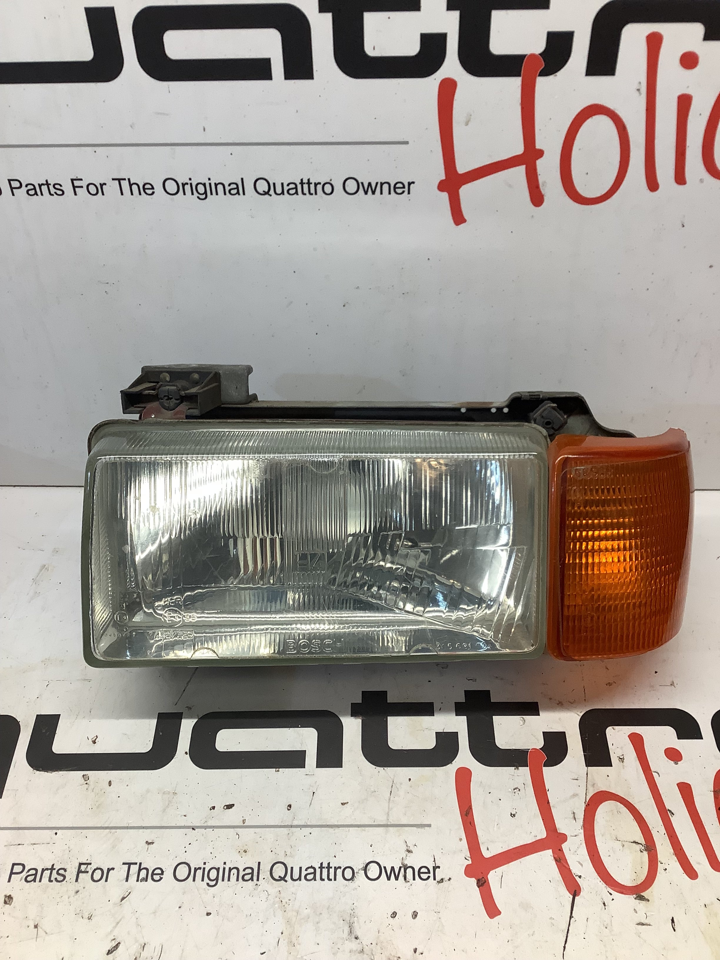 Driver Headlight Assembly Bosch 1305621024 European H4 – Quattroholics