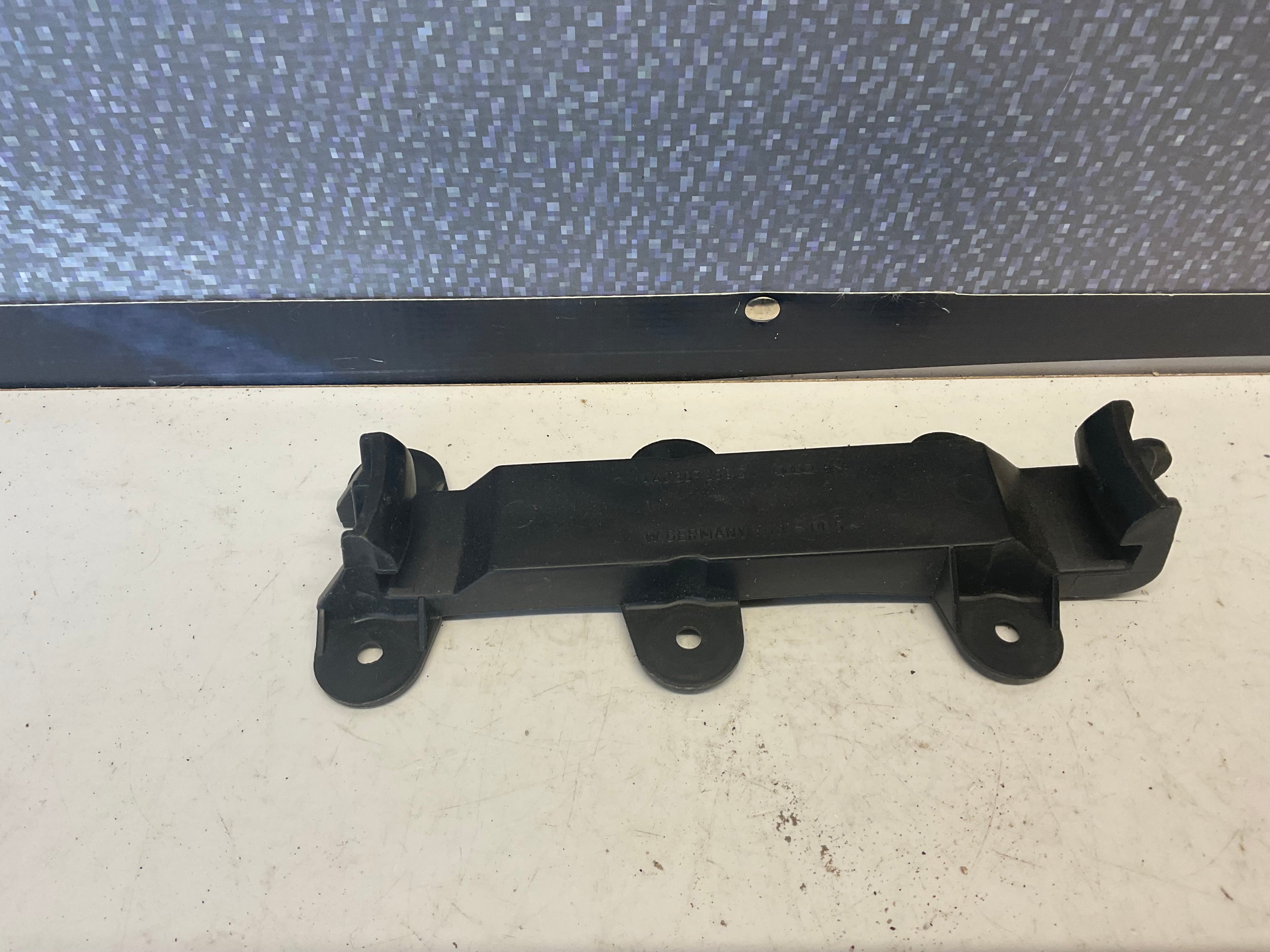 Bumper Attachment Bracket 4A0807253C C4 NOS – Quattroholics